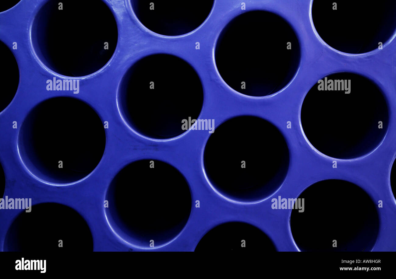 Abstract blue plastic circular object background with repetitive ...