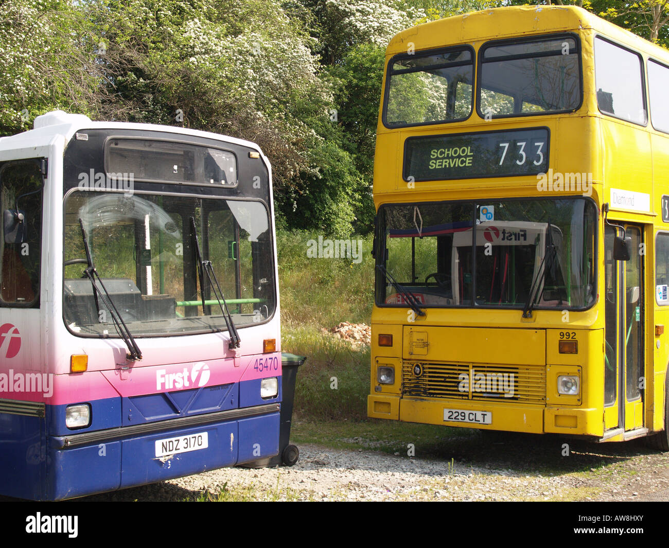 parked old 1970s single double decker bus buses Stock Photo - Alamy