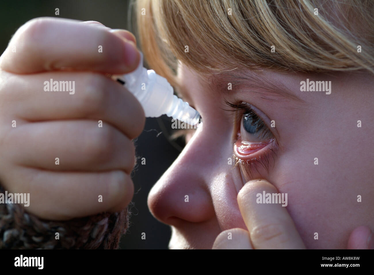 Eye drops application hi-res stock photography and images - Alamy
