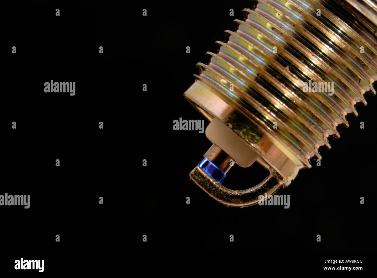 Macro image of spark plug with real sparks Stock Photo - Alamy