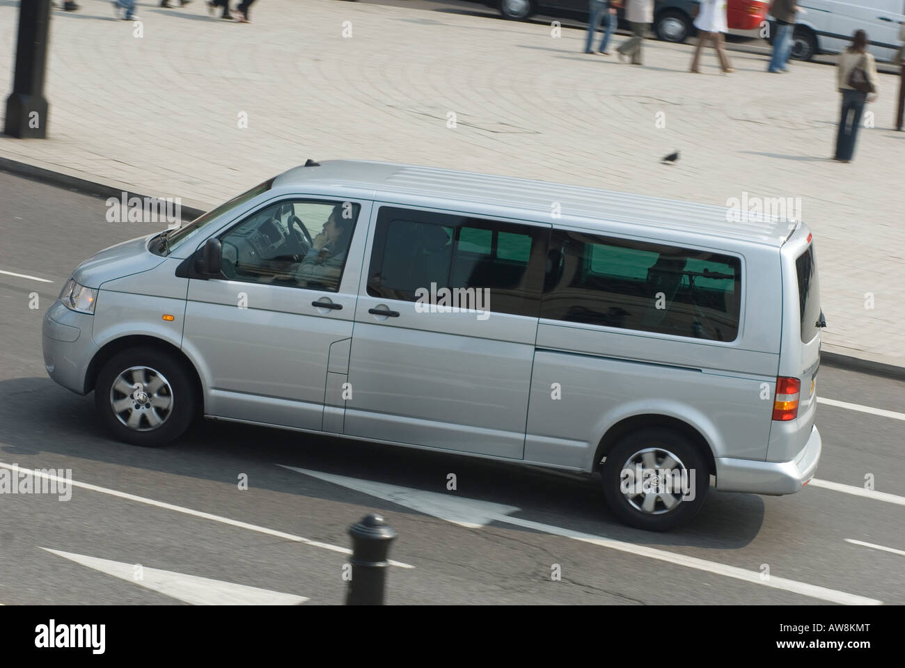 Volkswagen Transporter minibus driving through the city of london Stock ...