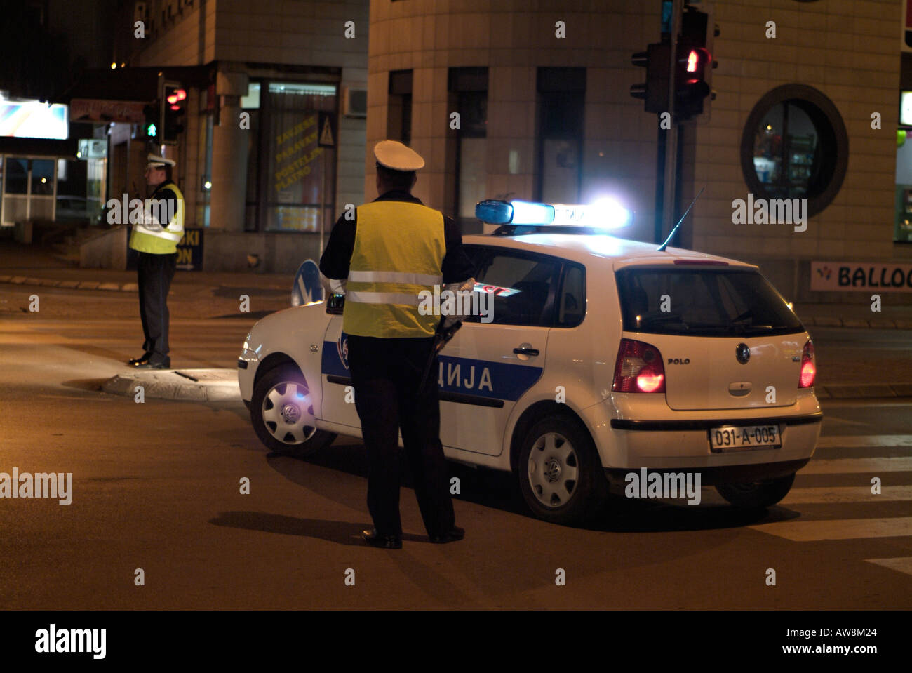 Bosnian Traffic Police manning a road block at night Banja Luka Bosnia ...