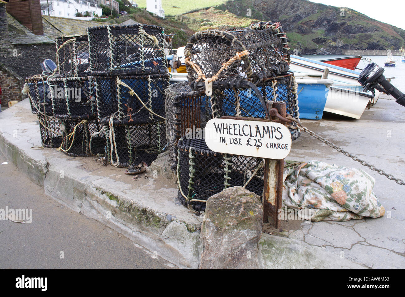 Wheelclamps sign on the beach Stock Photo - Alamy