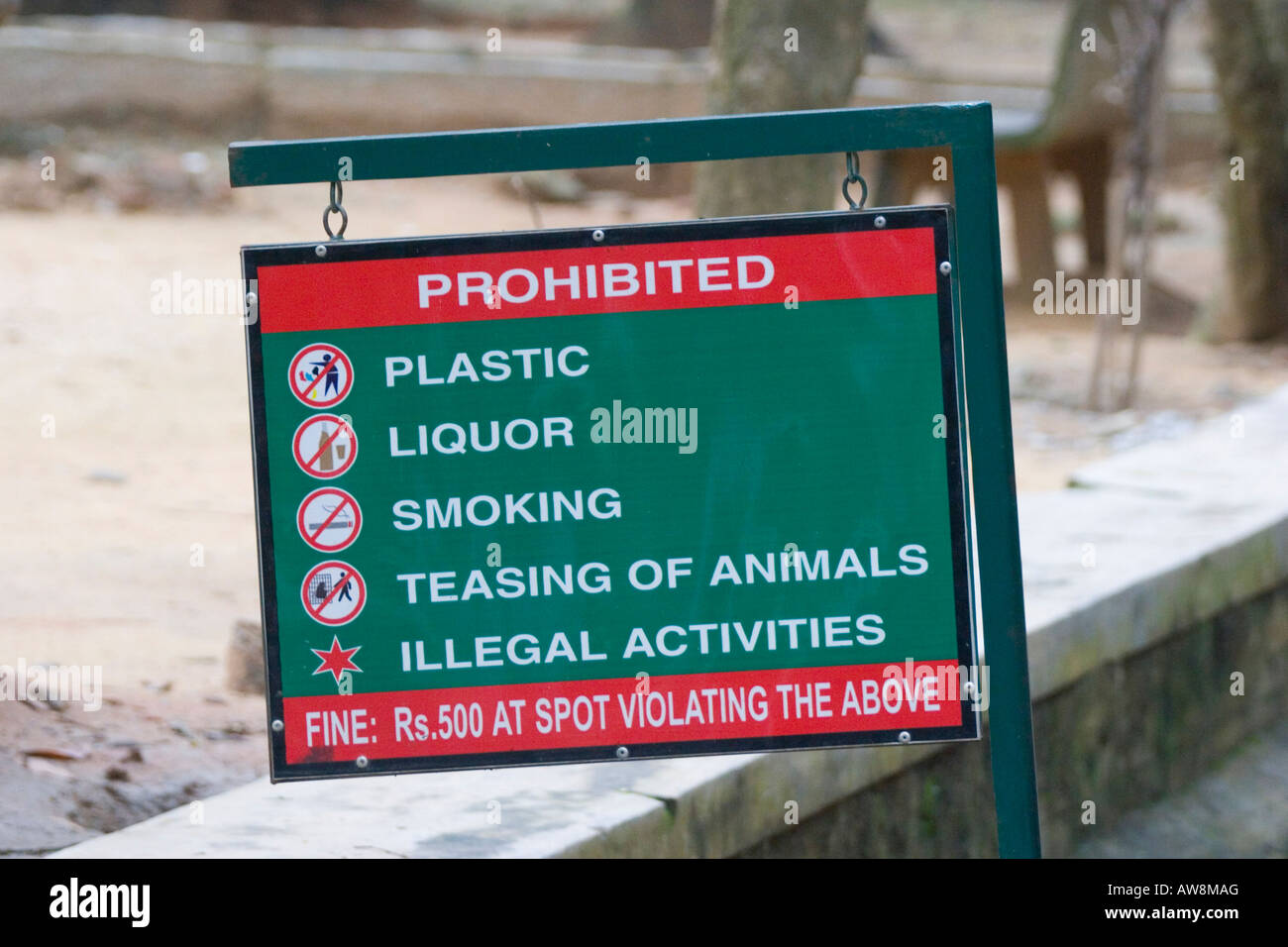 Sign warning of No illegal activities Stock Photo - Alamy