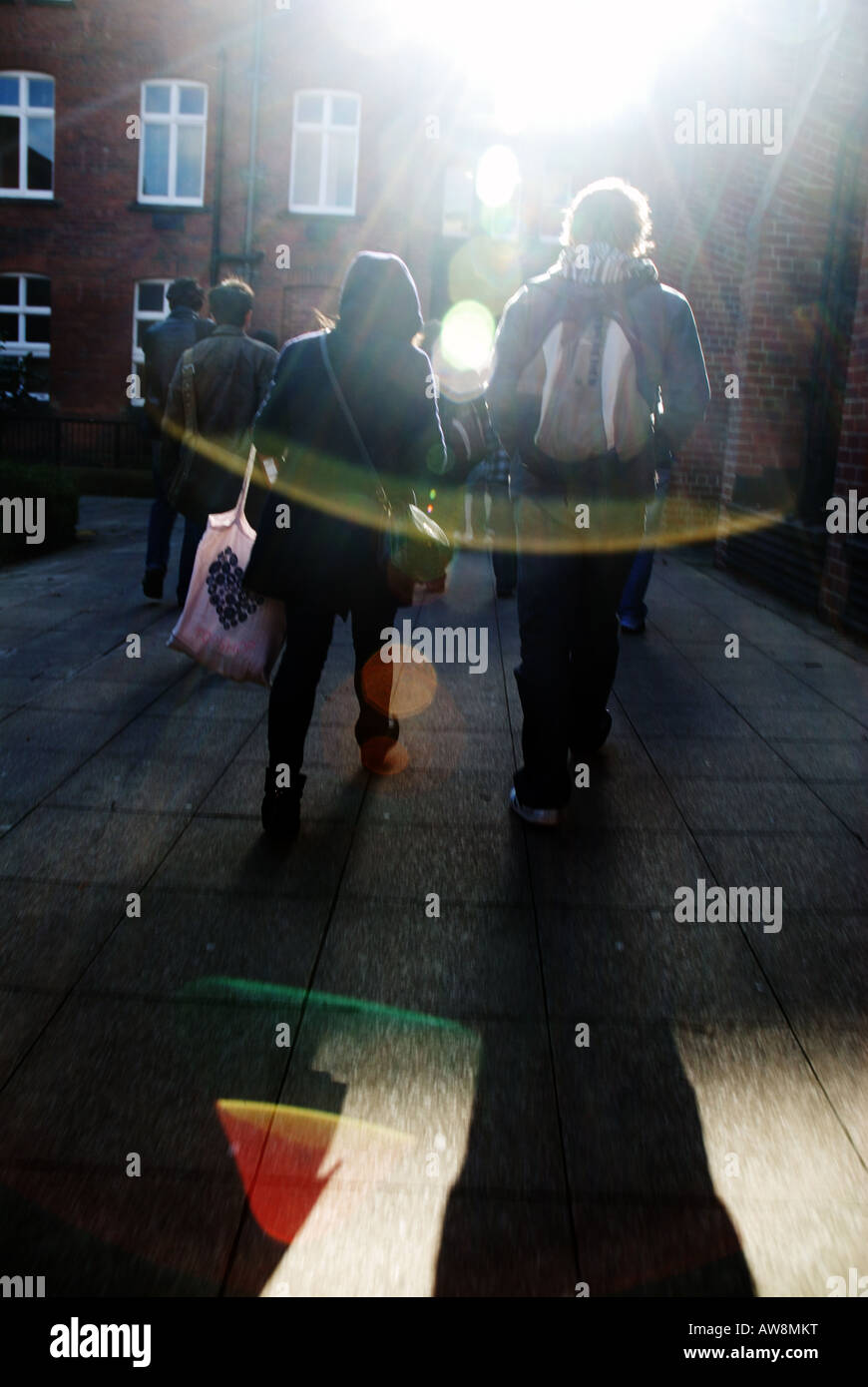 Students walking into a bright future Stock Photo - Alamy