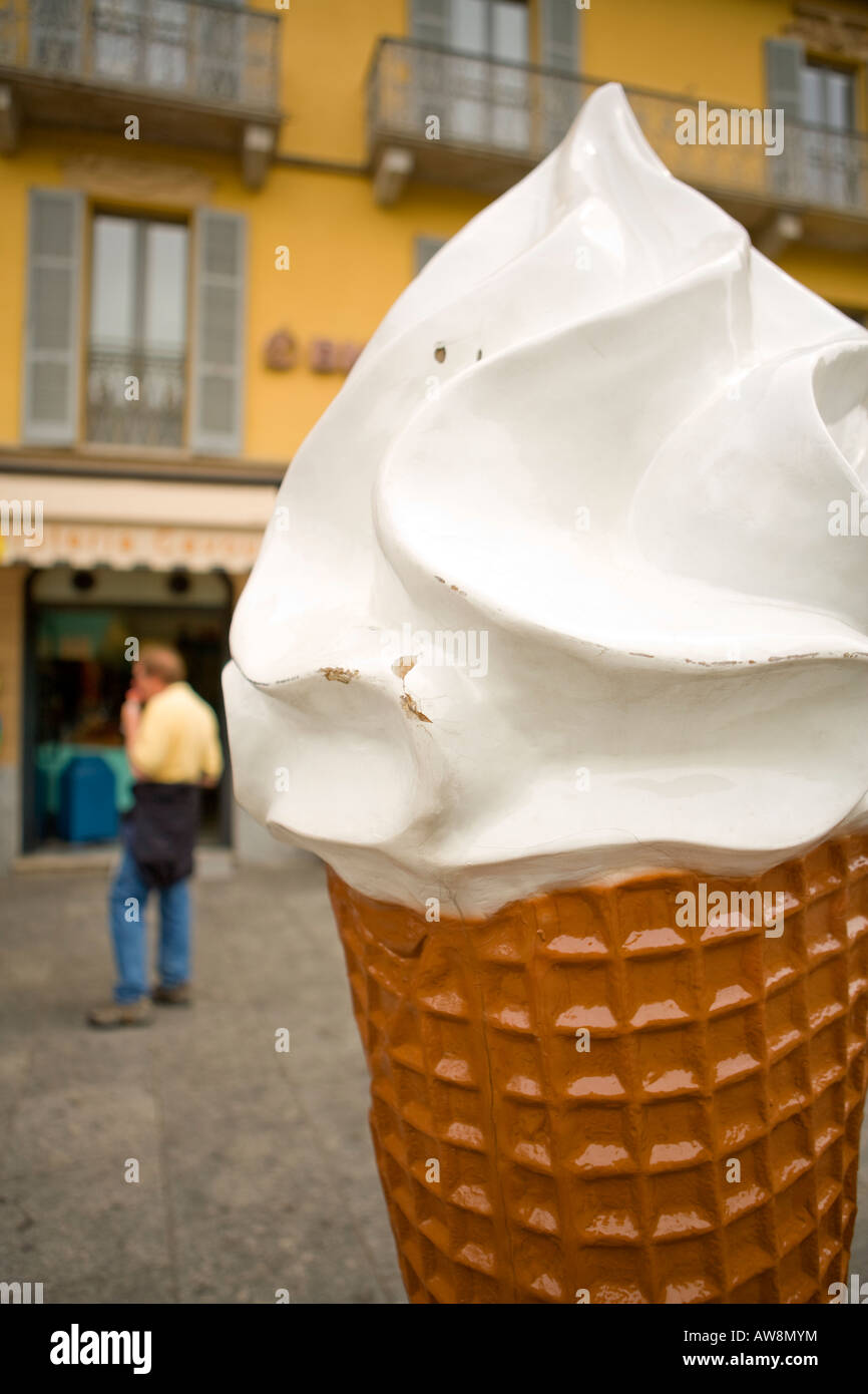 An oversize gelato cone stands in front of a gelato stand in Como ...