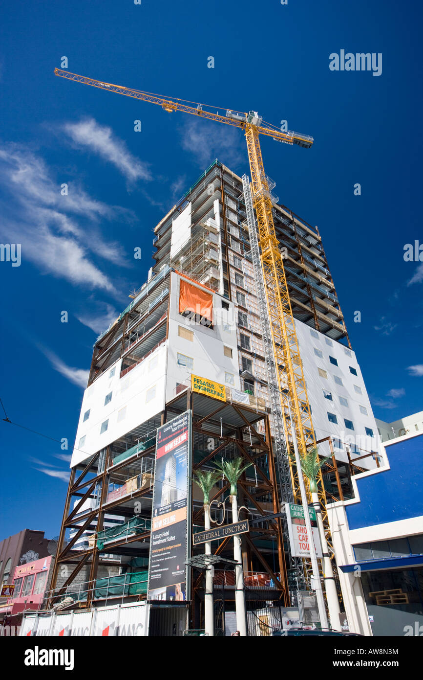 High rise crane constructing a new apartment block Stock Photo - Alamy