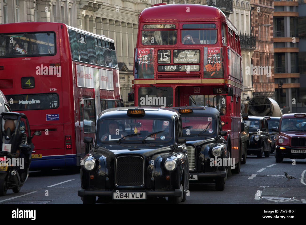 London buses and taxis Stock Photo - Alamy