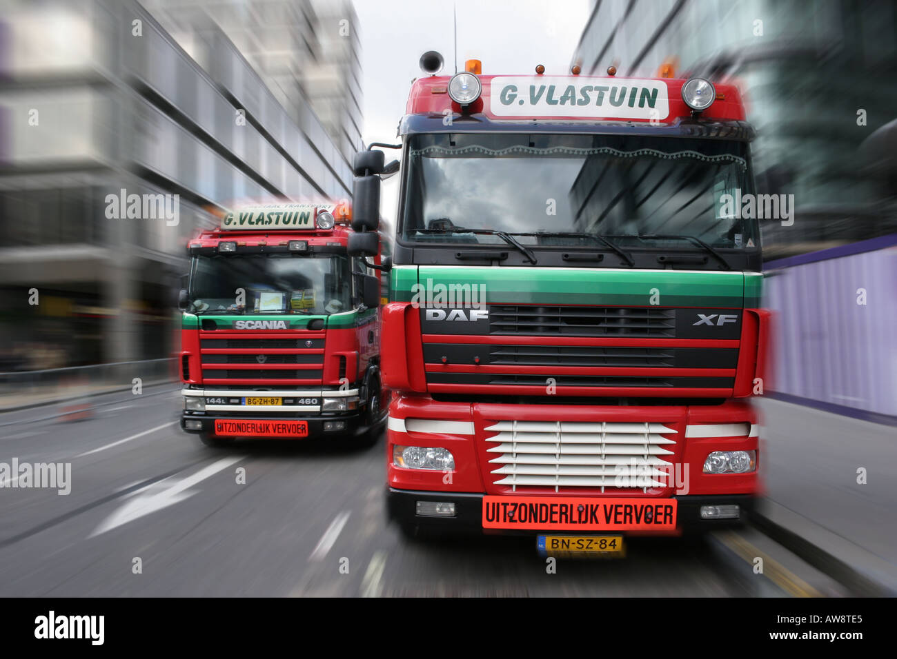 Two Dutch heavy lift trucks driving through London's Victoria Street on ...