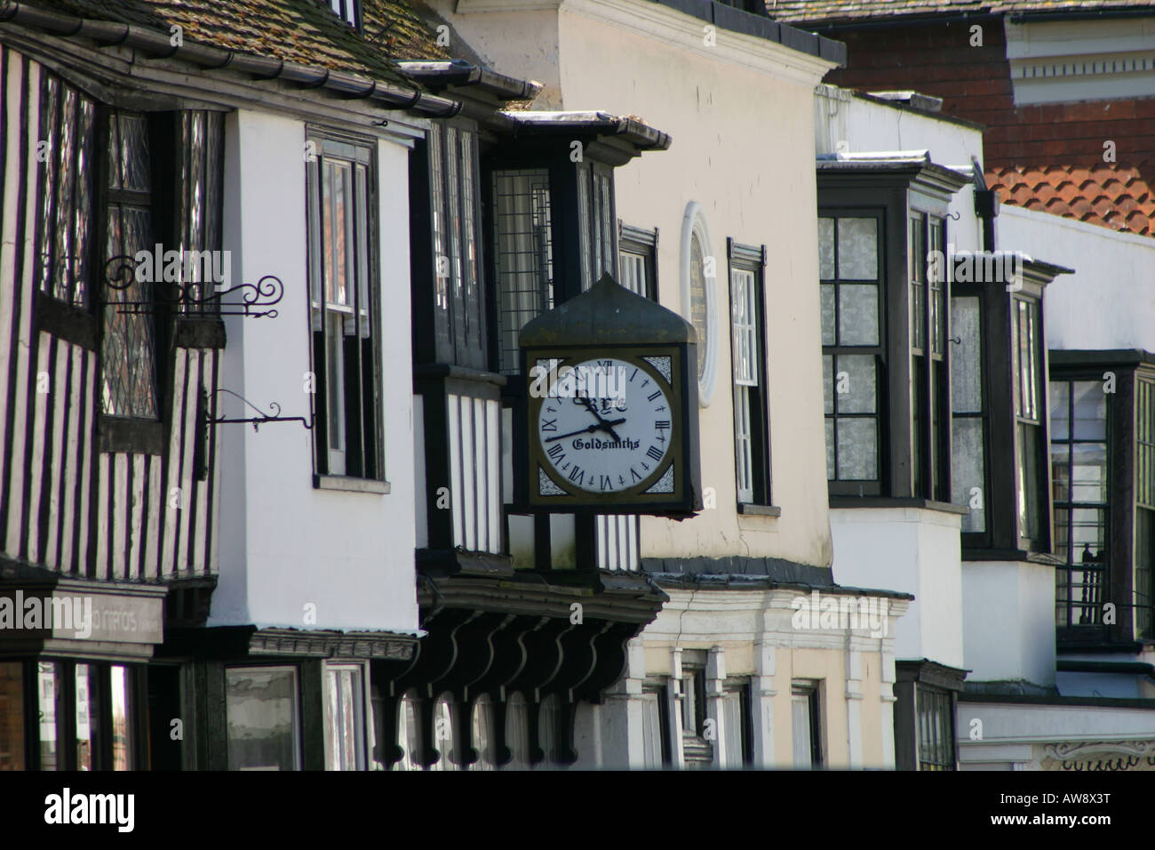 old historic building fronts clock timepiece Stock Photo - Alamy