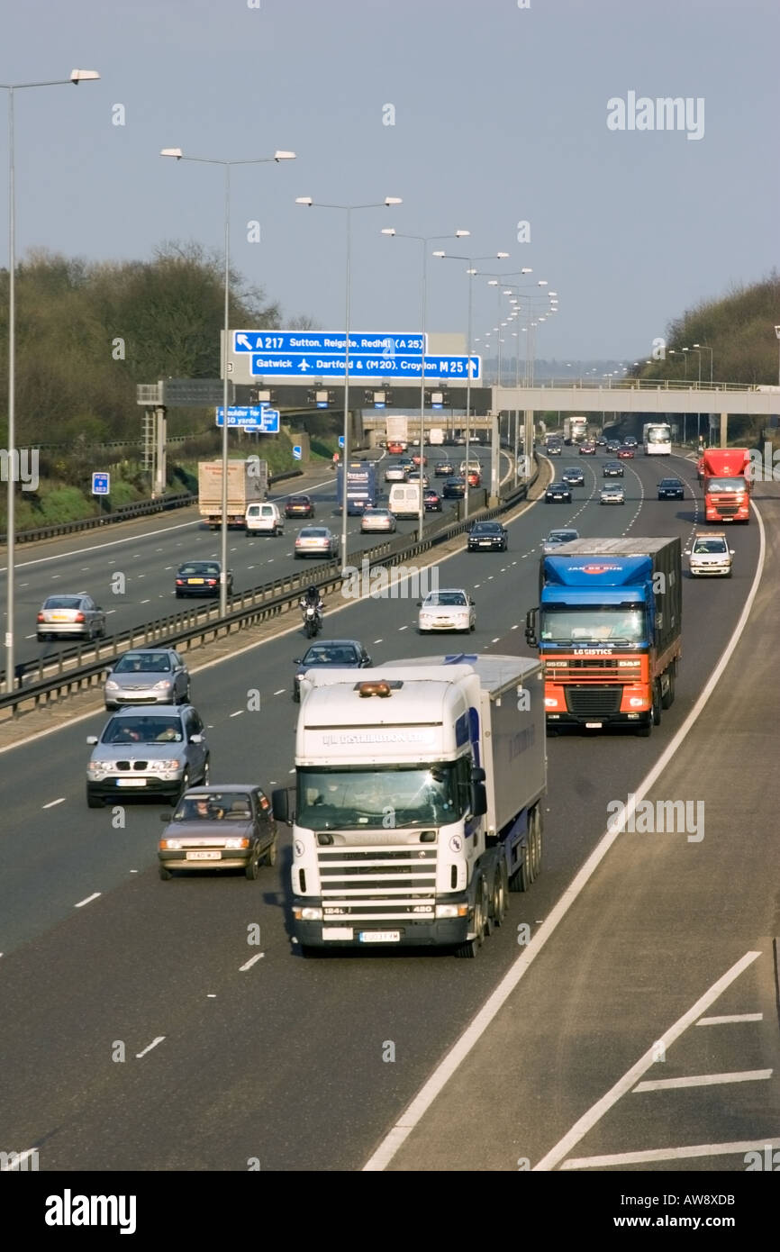 lorries on the m25 motorway in surrey england Stock Photo - Alamy