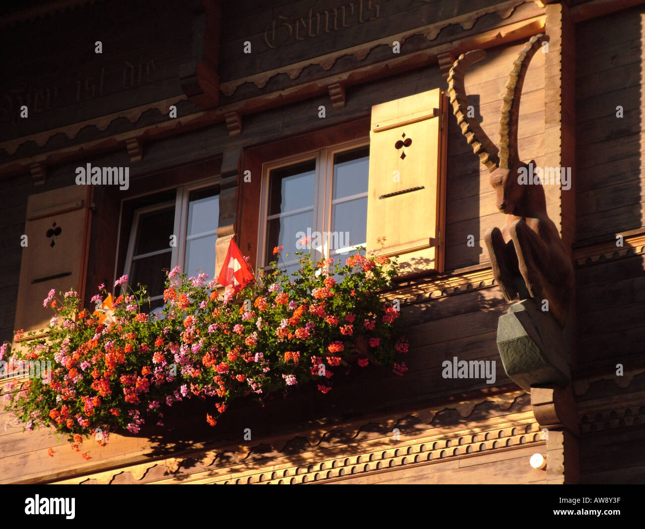 Traditional swiss chalet window boxes hi-res stock photography and ...