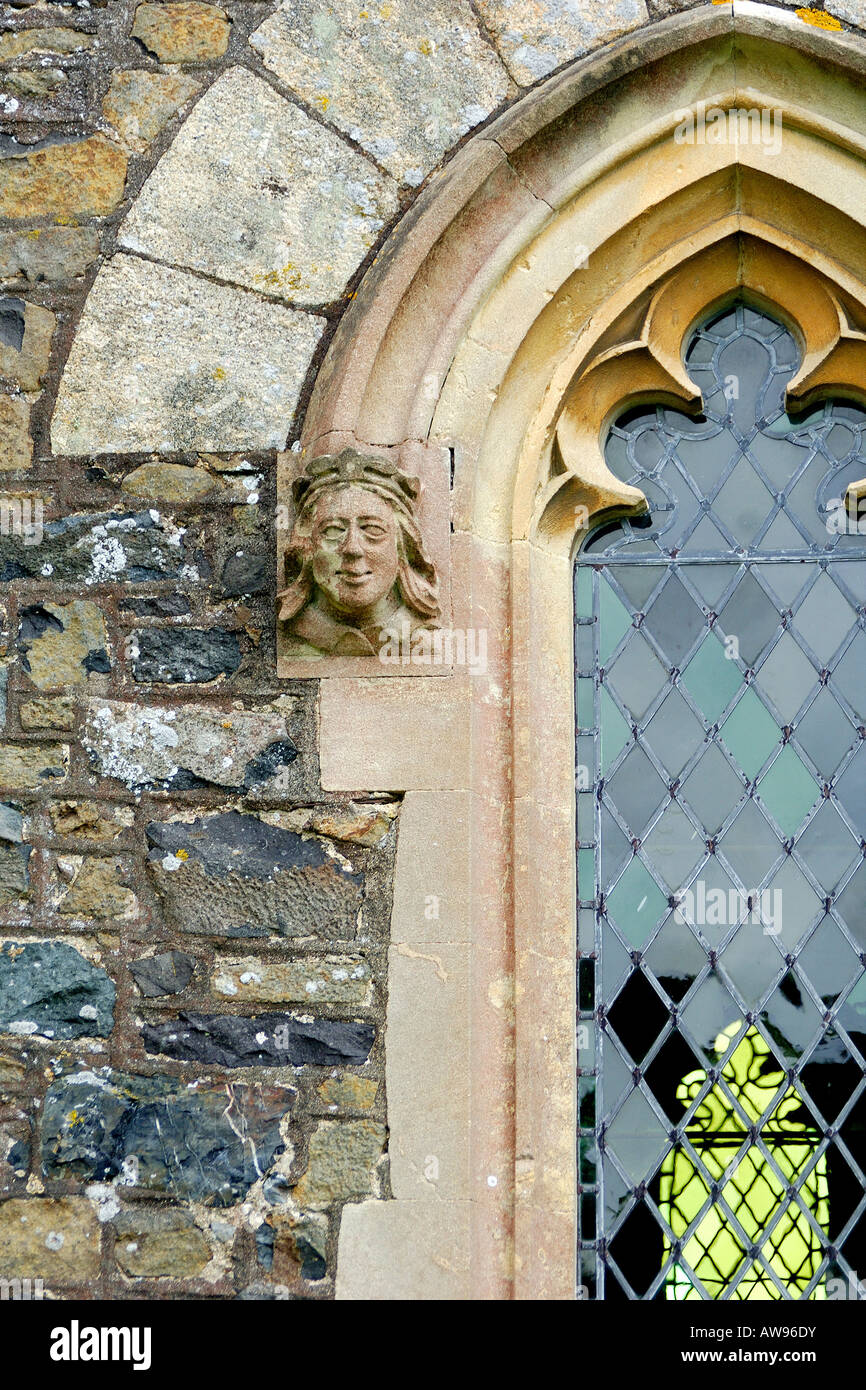 Architectural detail close up of a gothic arched church window with a ...