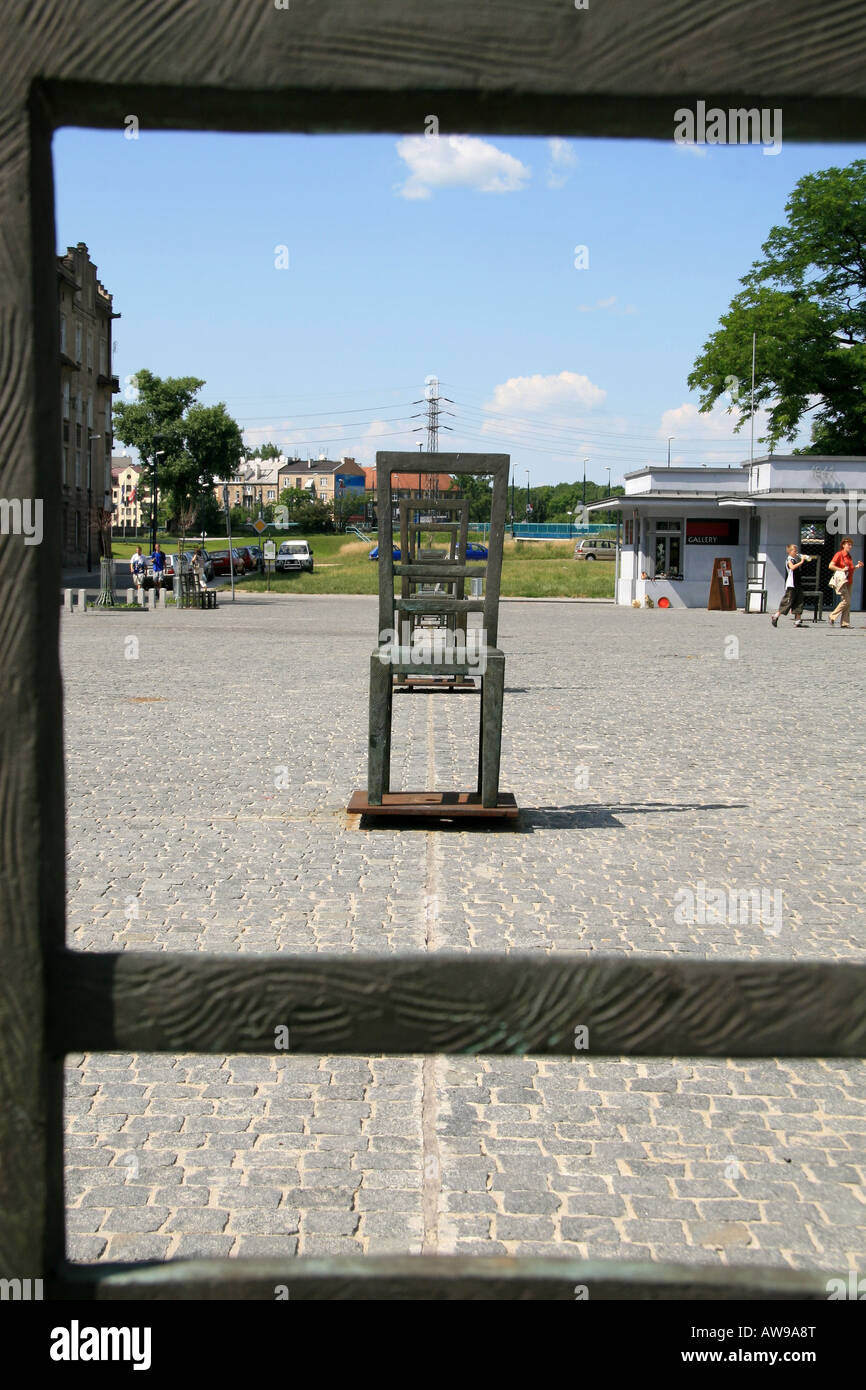 Looking through a chair in the Krakow Ghetto Memorial in Plac Bohaterów ...