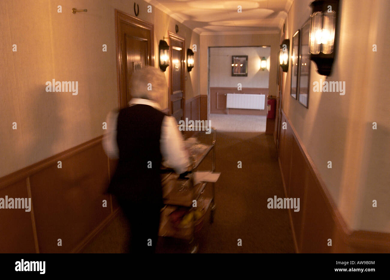 Conference hostess clearing a conference room after a meeting Stock ...