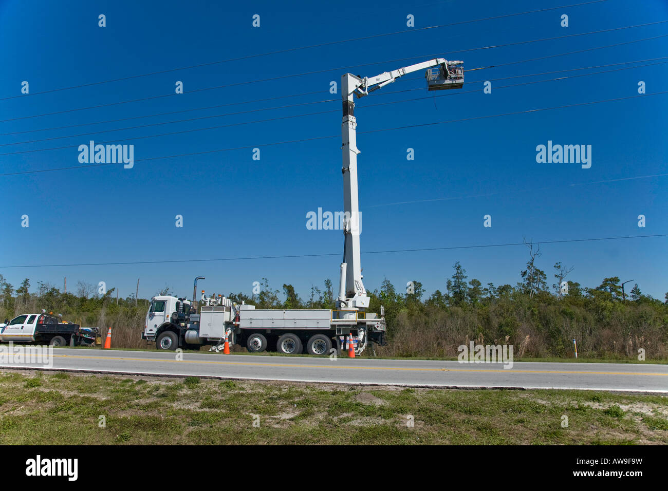 Service maintenance workers working on hydro Electrical Power Line from ...