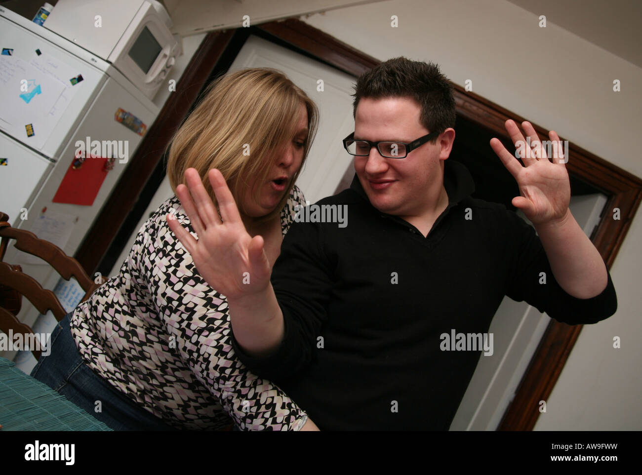 Couple dancing at home Stock Photo - Alamy