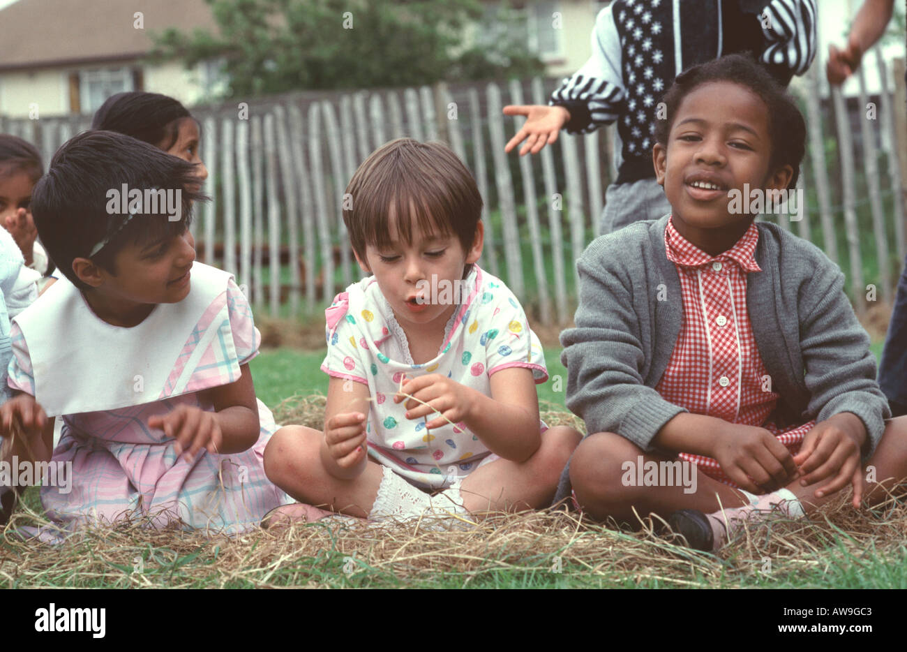 Primary playground girls together Stock Photo - Alamy