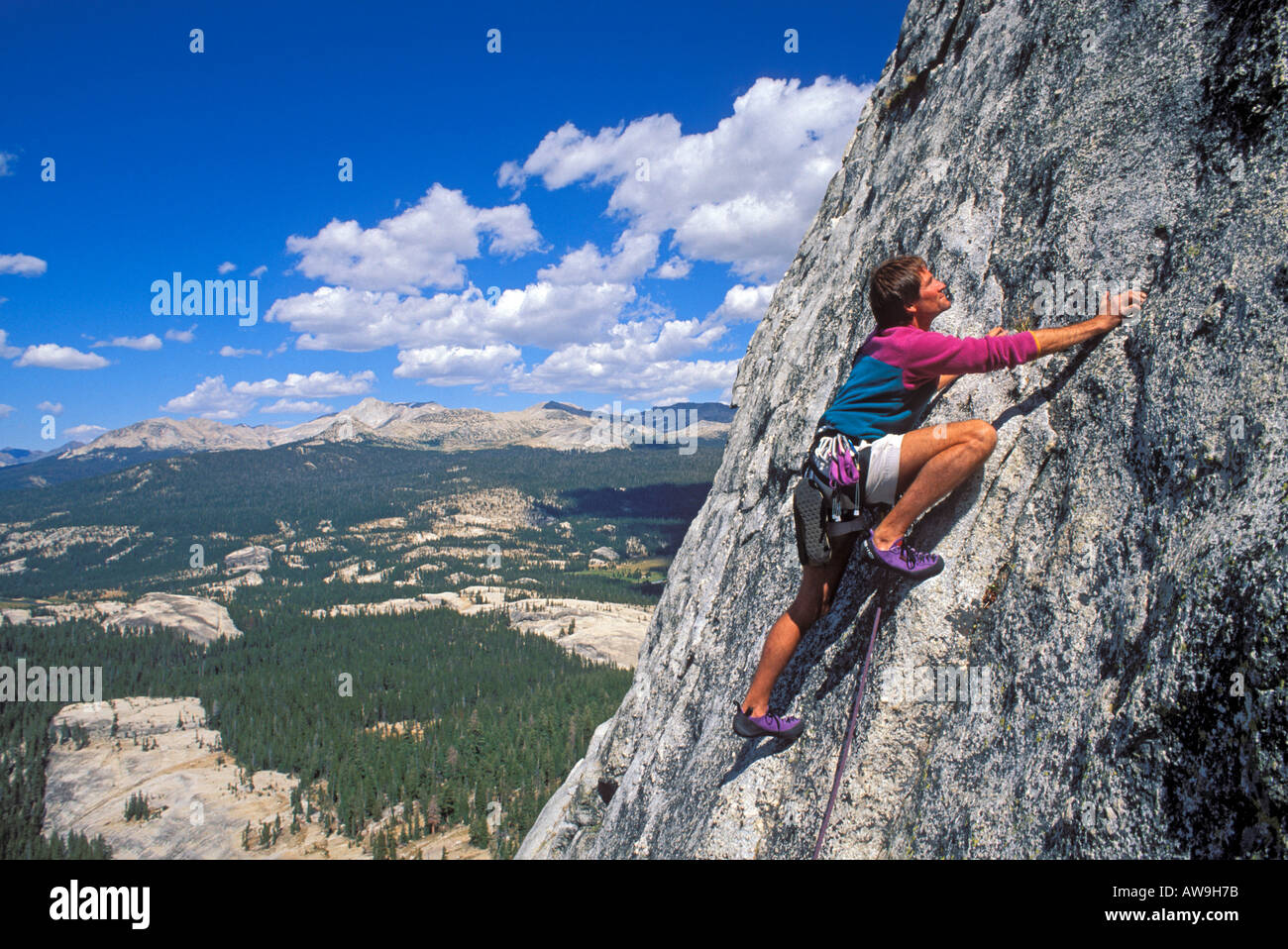 Climber on Fairview Dome Tuolumne Meadows area Sierra Nevada Mountains ...