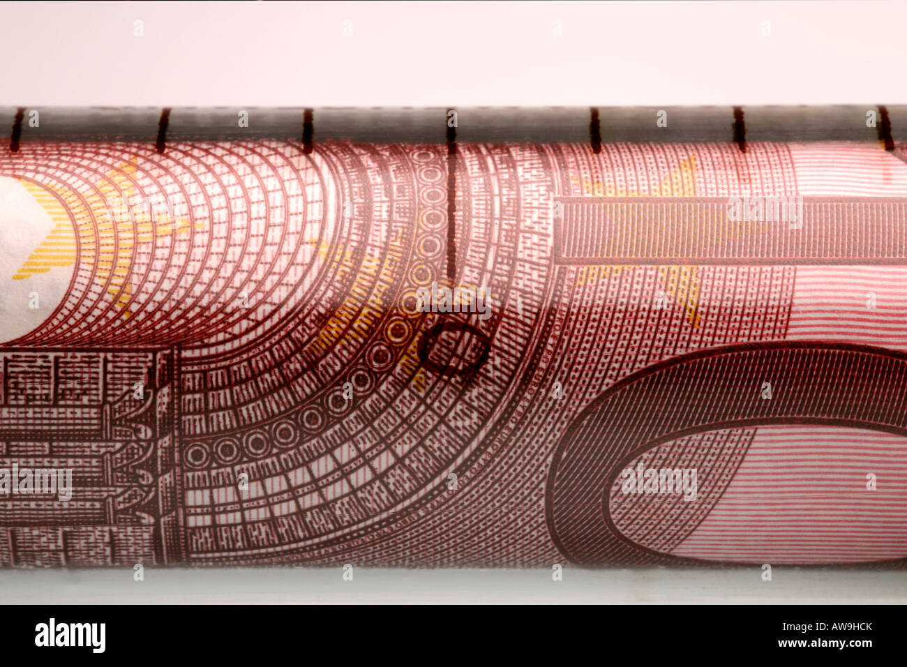 "Syringe containing bank note Stock Photo - Alamy