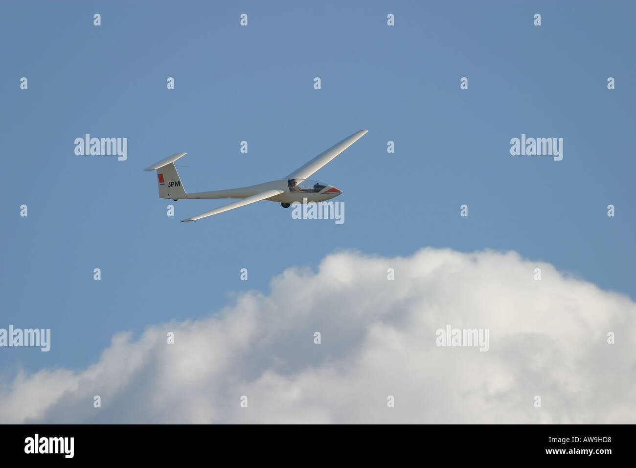 A modern single seat glider turning before landing Stock Photo - Alamy