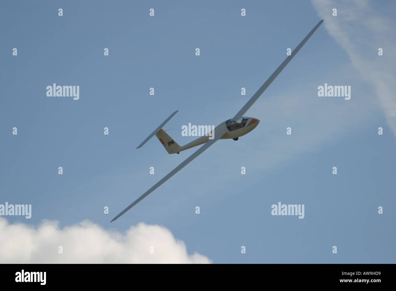 A modern single seat glider turning before landing Stock Photo - Alamy