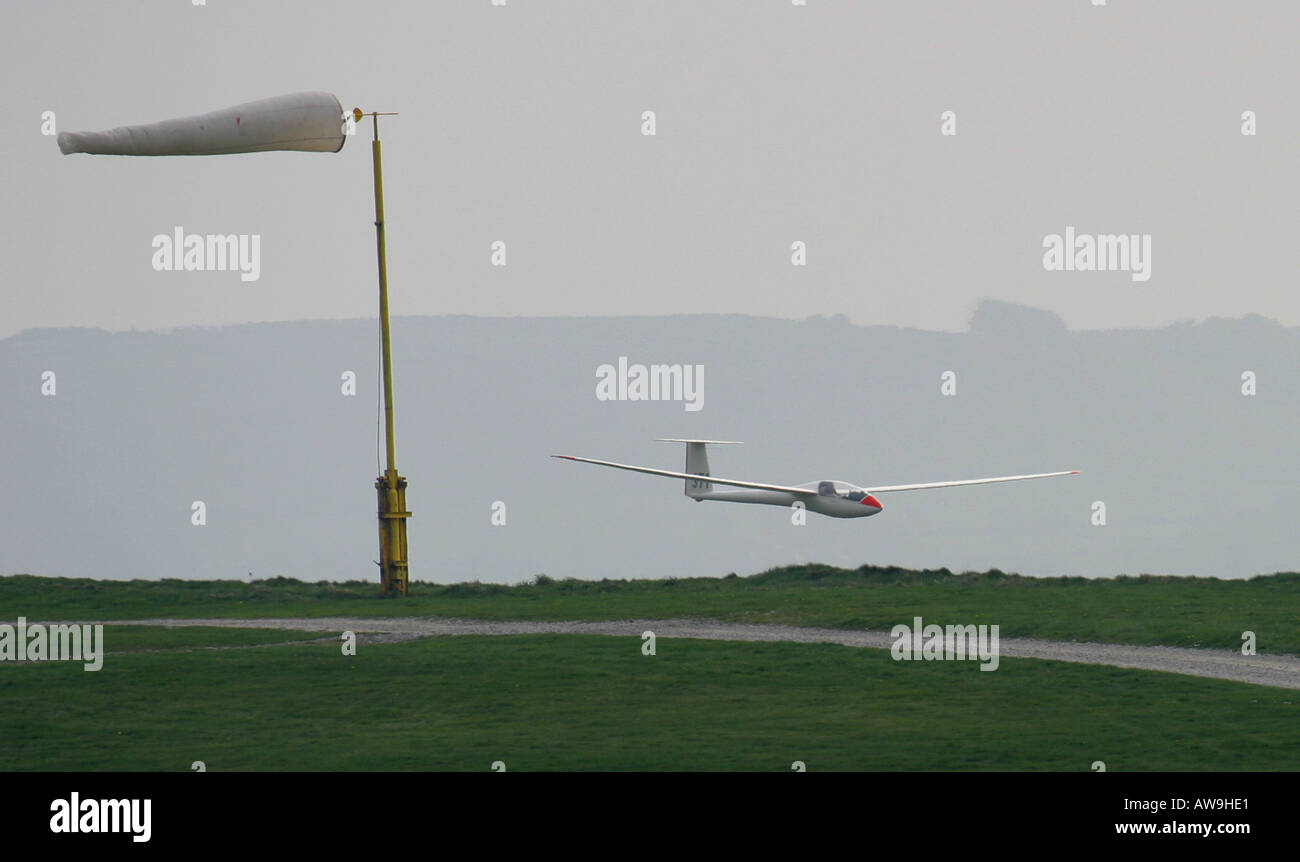 A modern high performance glider soaring in ridge lift Stock Photo - Alamy