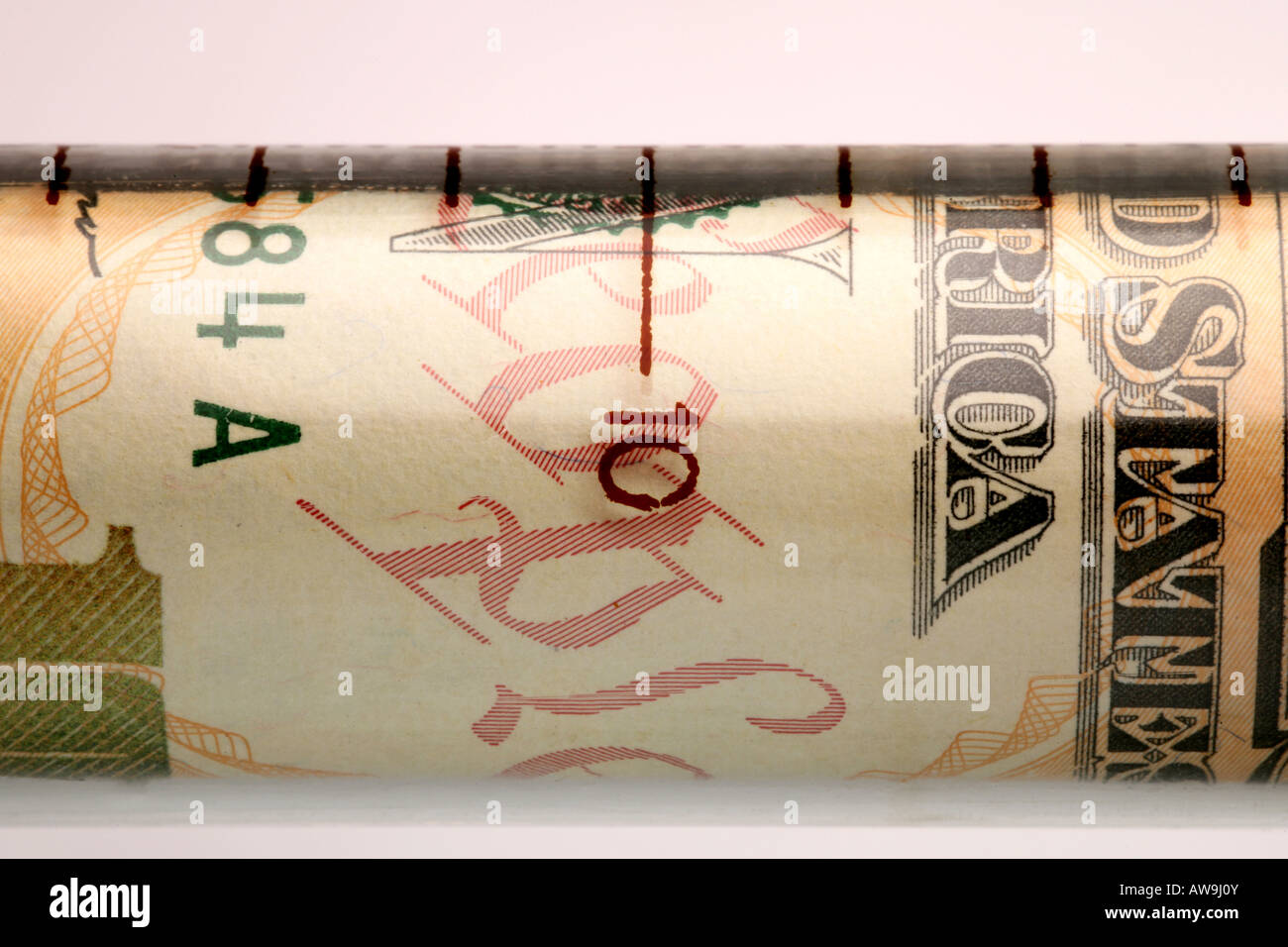 "Syringe containing bank note Stock Photo - Alamy