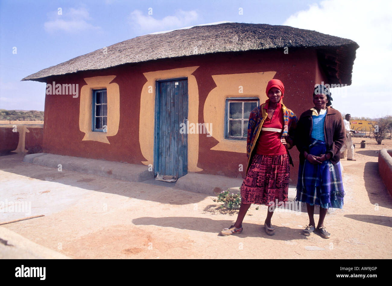 Ladies with decorated hut Stock Photo - Alamy