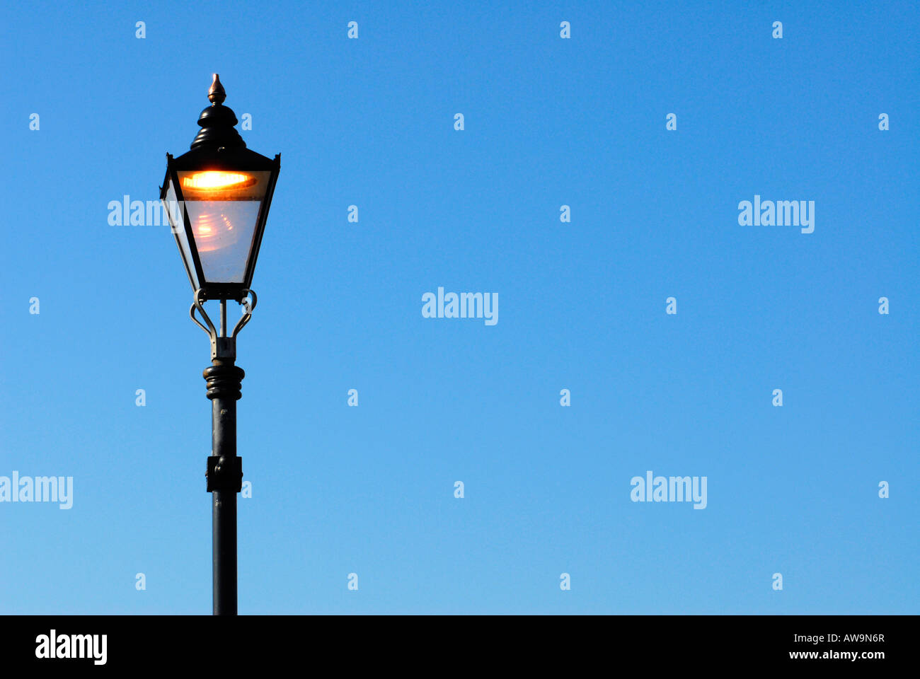 Street Light left on during the day Stock Photo - Alamy