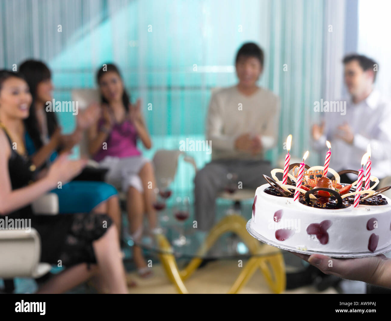 Friends celebrating in the birthday party Stock Photo - Alamy