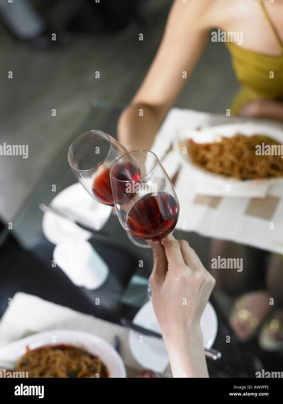 top view of two women propose a toast Stock Photo - Alamy