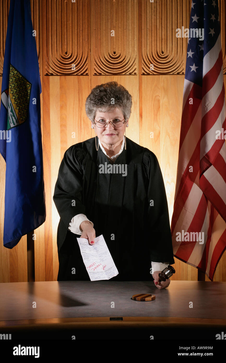 Judge handing out a judgement Stock Photo - Alamy