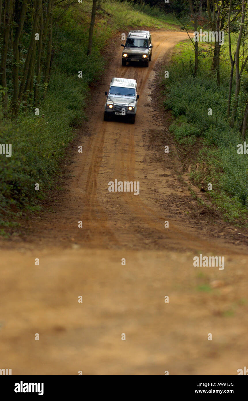 Land Rover Defender and Land Rover Discovery on the trails Stock Photo ...
