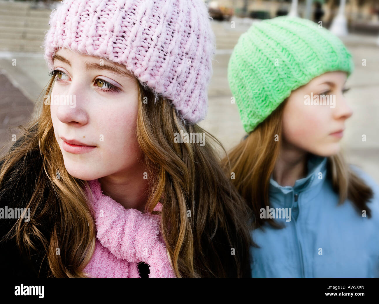 Two girls in toques Stock Photo - Alamy