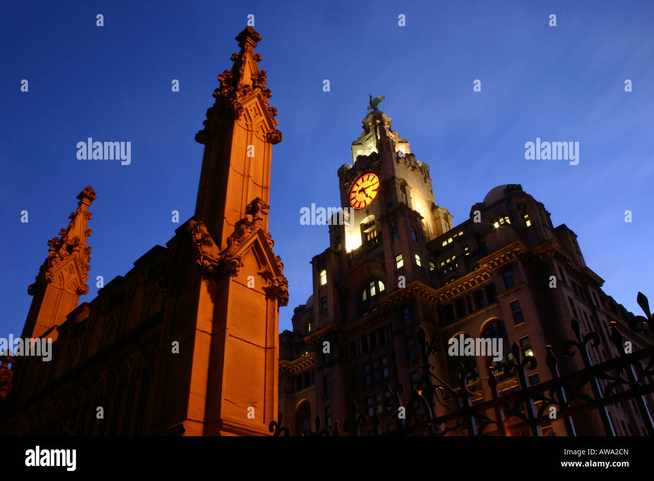 Liver building Spire with Church Gate Spires at Dusk Stock Photo - Alamy