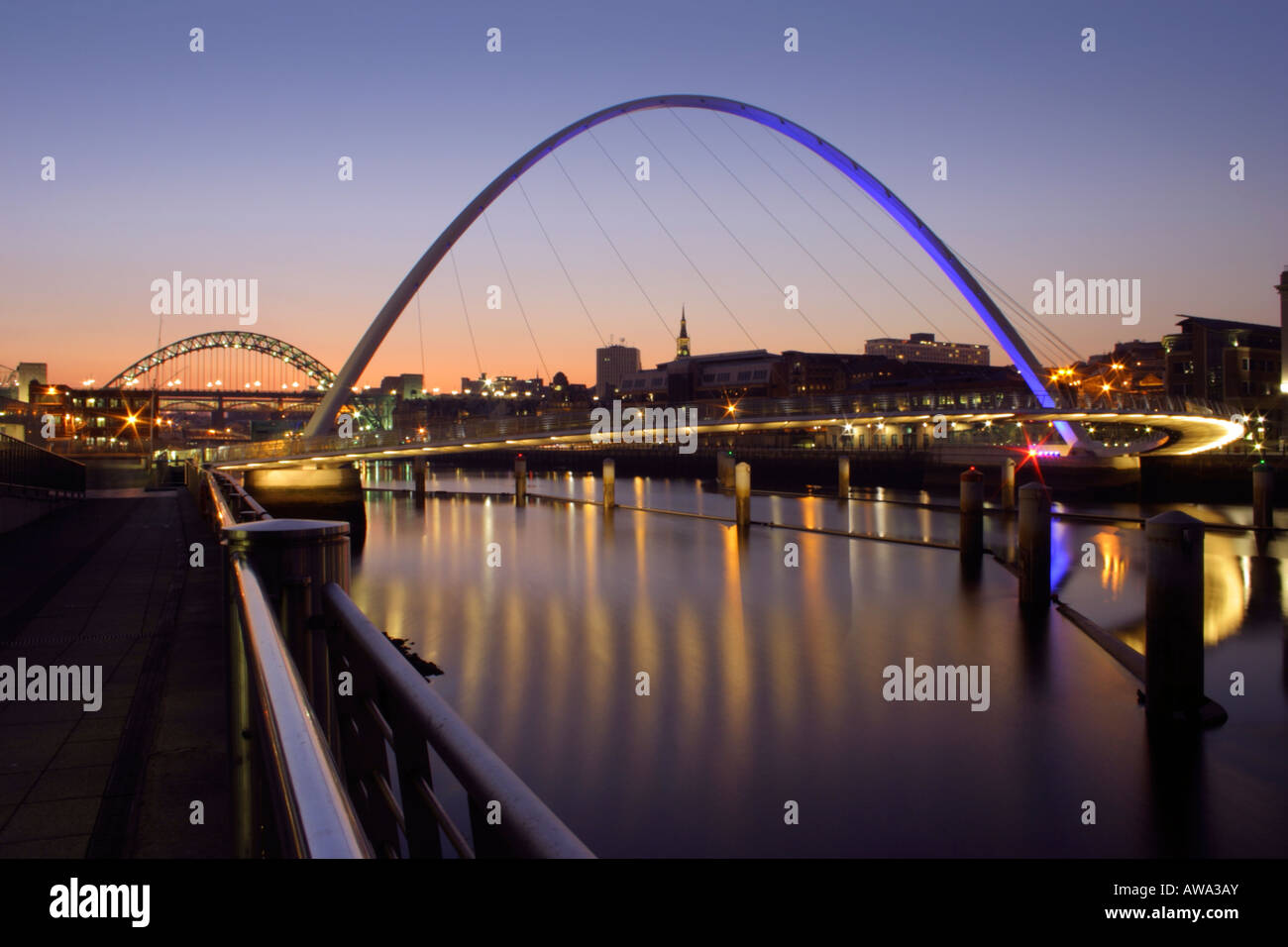 Newcastle Gateshead Quayside showing Millennium Bridge and Tyne Bridge ...
