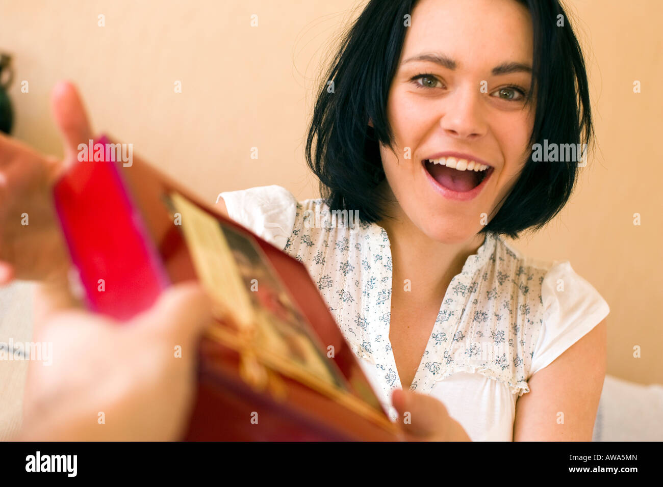 Woman with present Stock Photo - Alamy