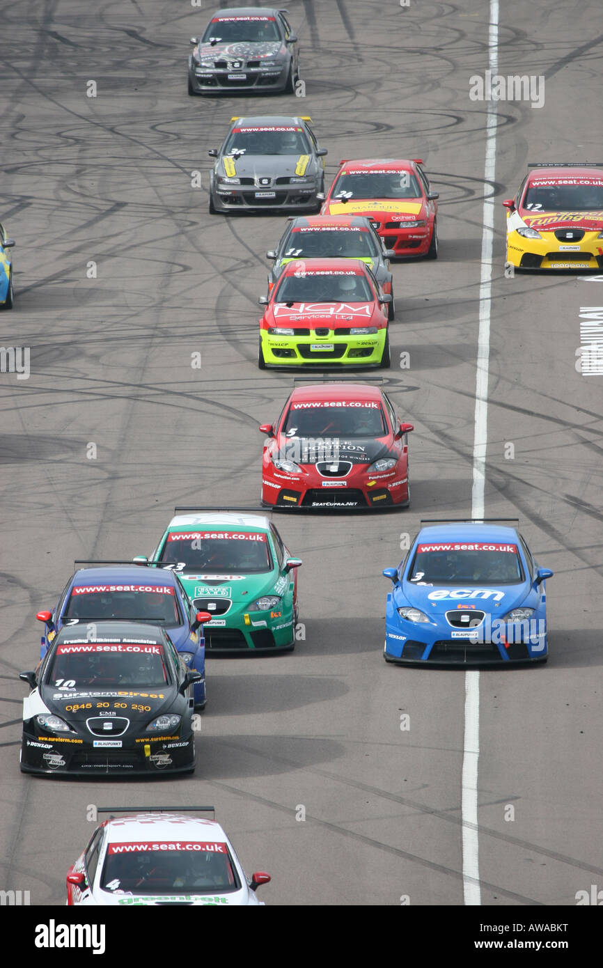 Seat Cupra race cars racing at Rockingham Stock Photo - Alamy
