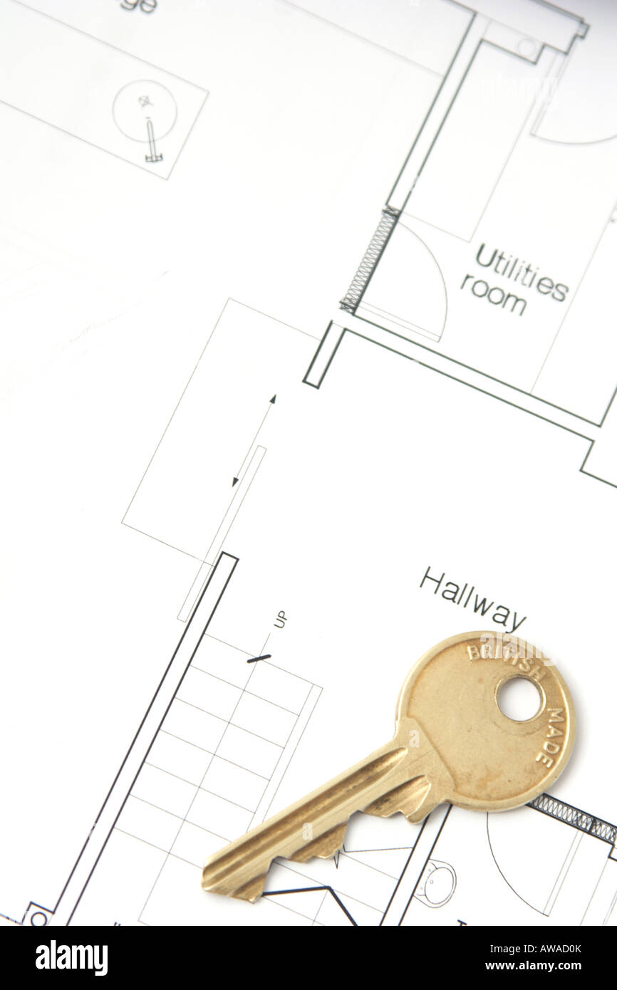 house key on architects building plans Stock Photo - Alamy