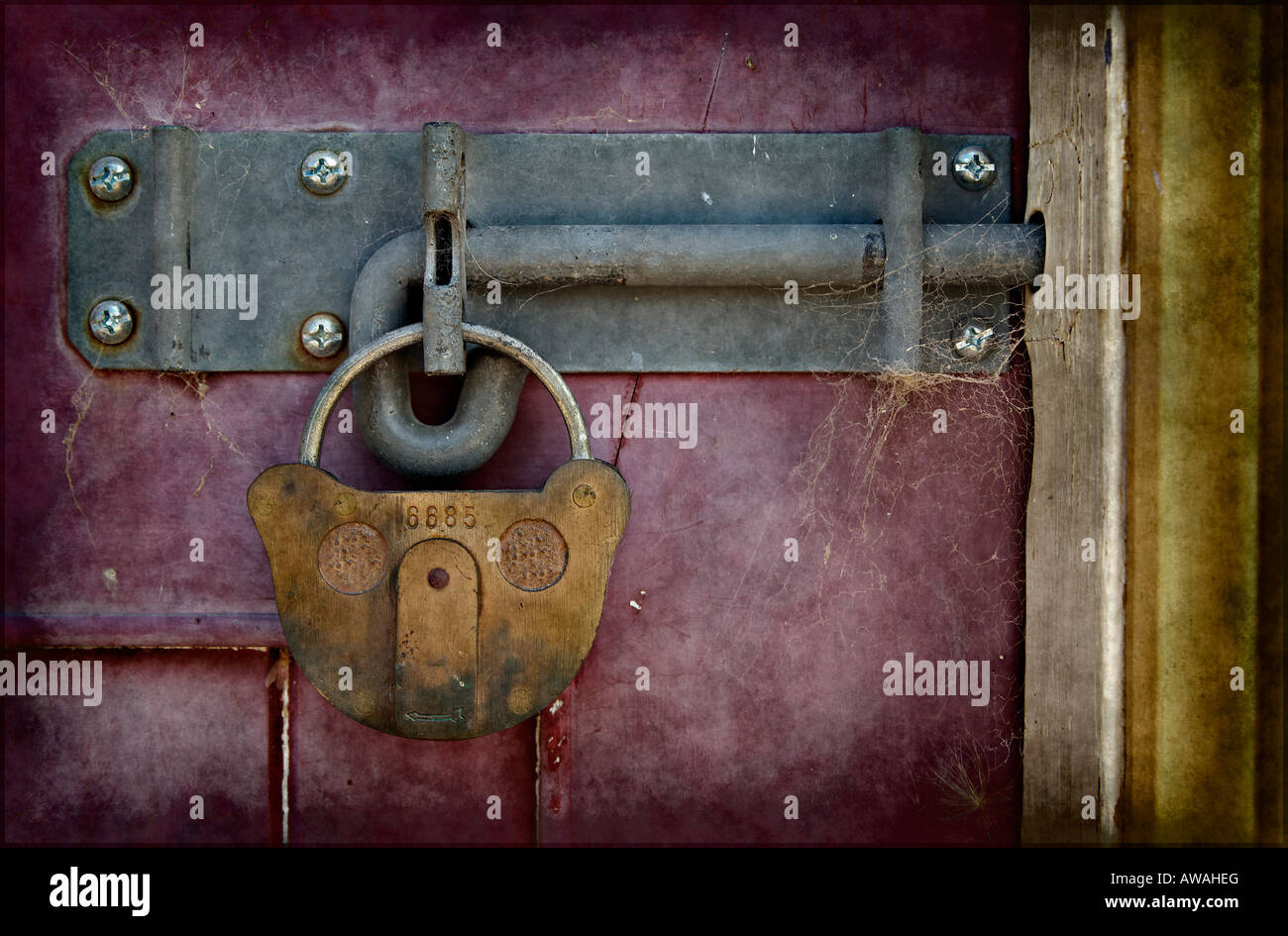 big old lock keeps this door shut Stock Photo - Alamy