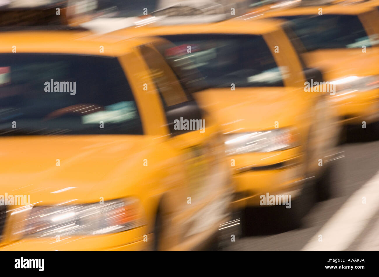 Three taxi cabs on street in New York NY Stock Photo - Alamy