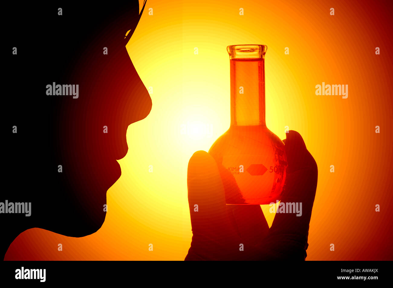woman doctor examining beaker specimen Stock Photo - Alamy