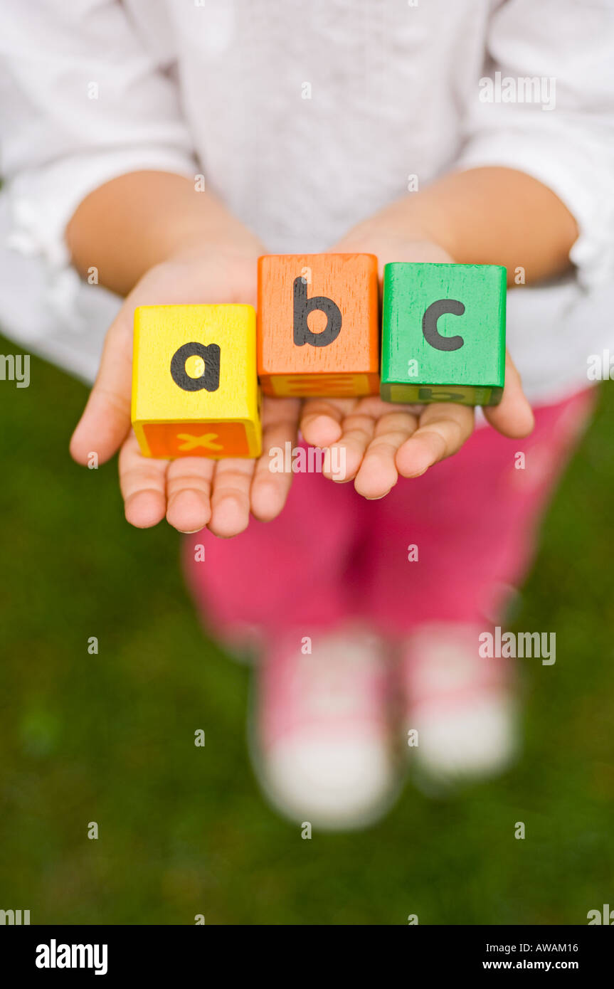 Girl playing letters abc alphabet hi-res stock photography and images ...
