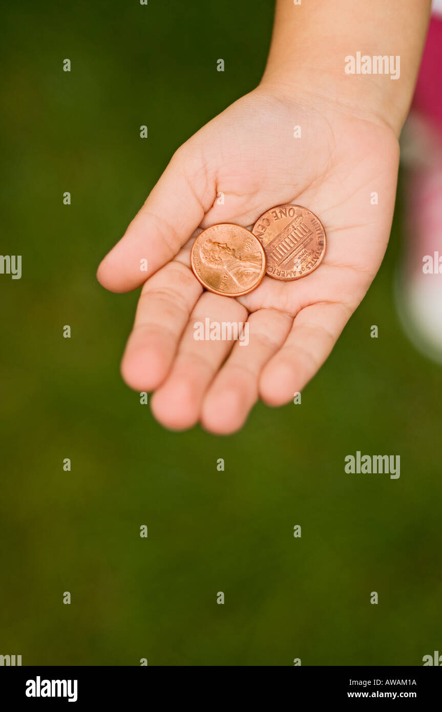 Coins to a child money for kids hi-res stock photography and images - Alamy