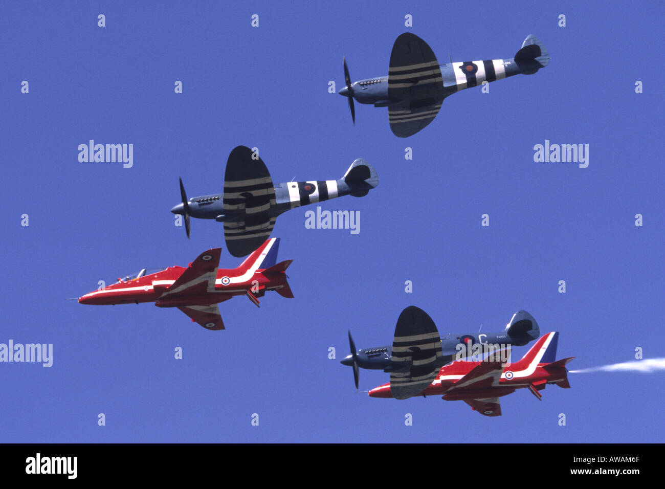 Supermarine Spitfire & Red Arrows Formation Stock Photo - Alamy