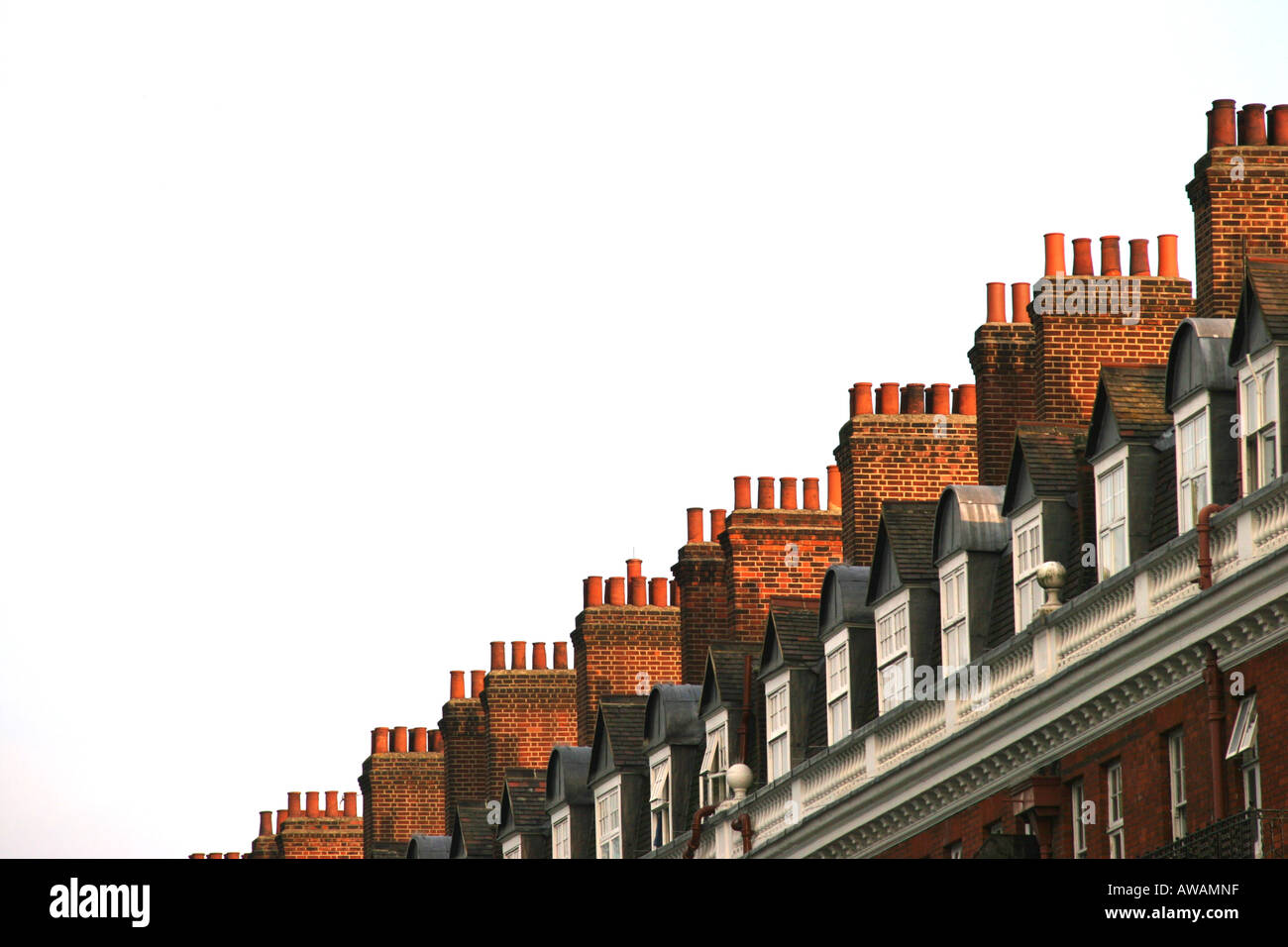 Row of Victorian roof chimney stacks in London UK Stock Photo - Alamy