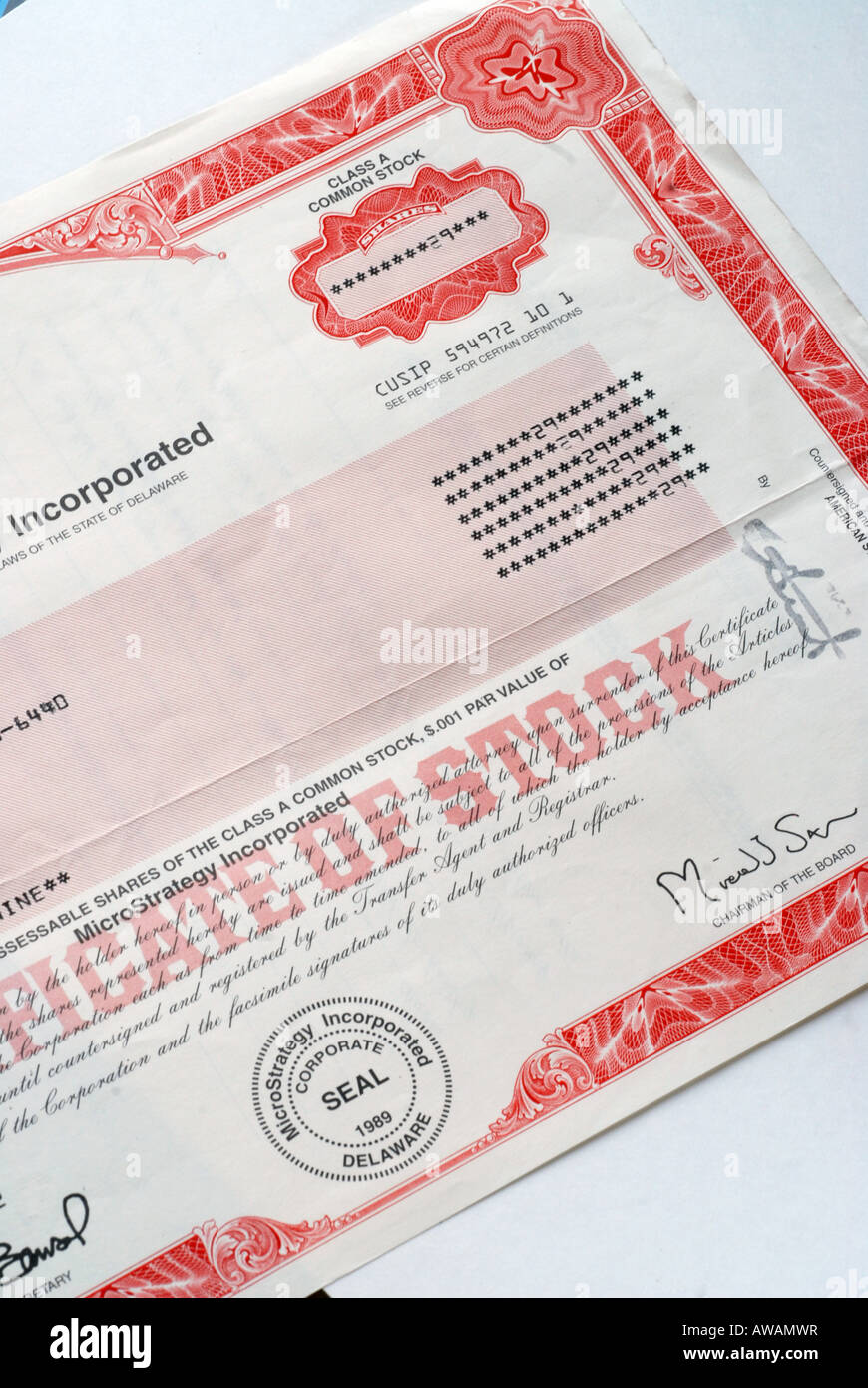 Miscrostrategies stock certificate on white background (closeup Stock ...