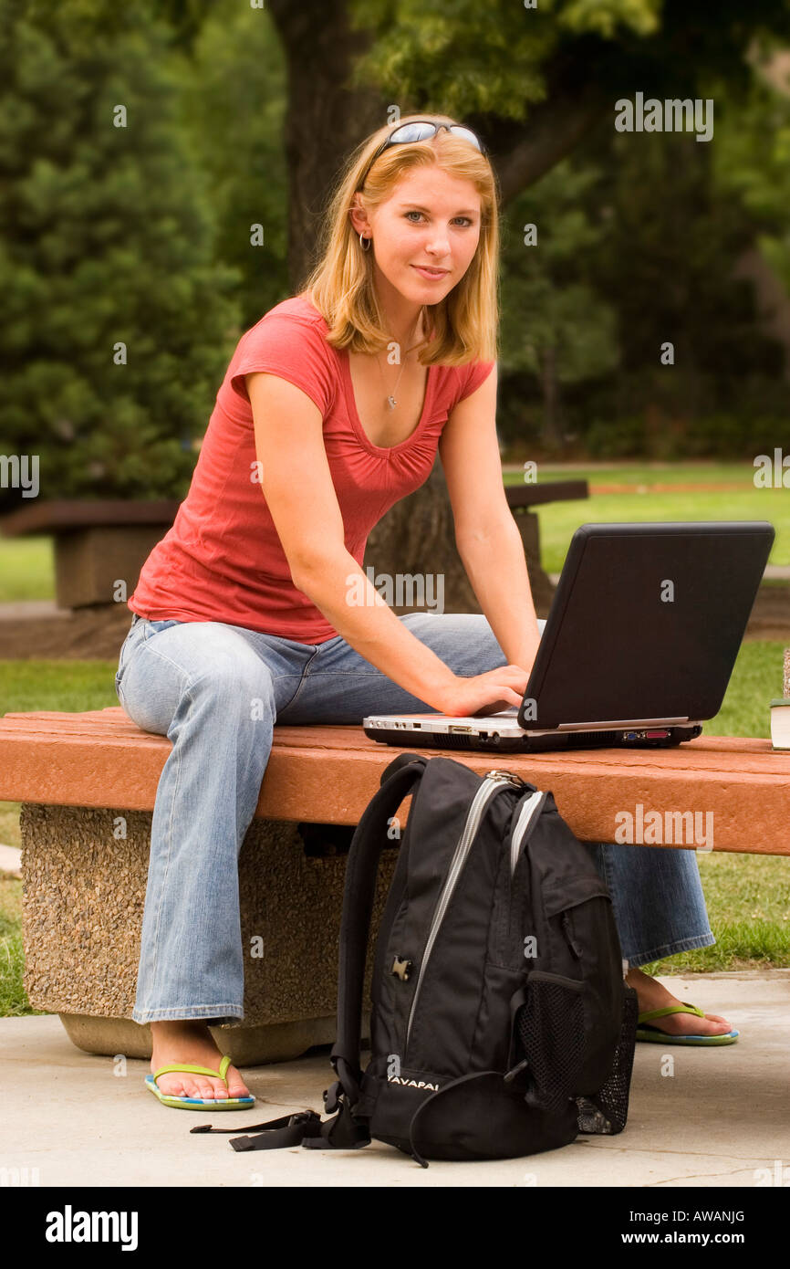 Young blonde female college student studying on campus Stock Photo - Alamy
