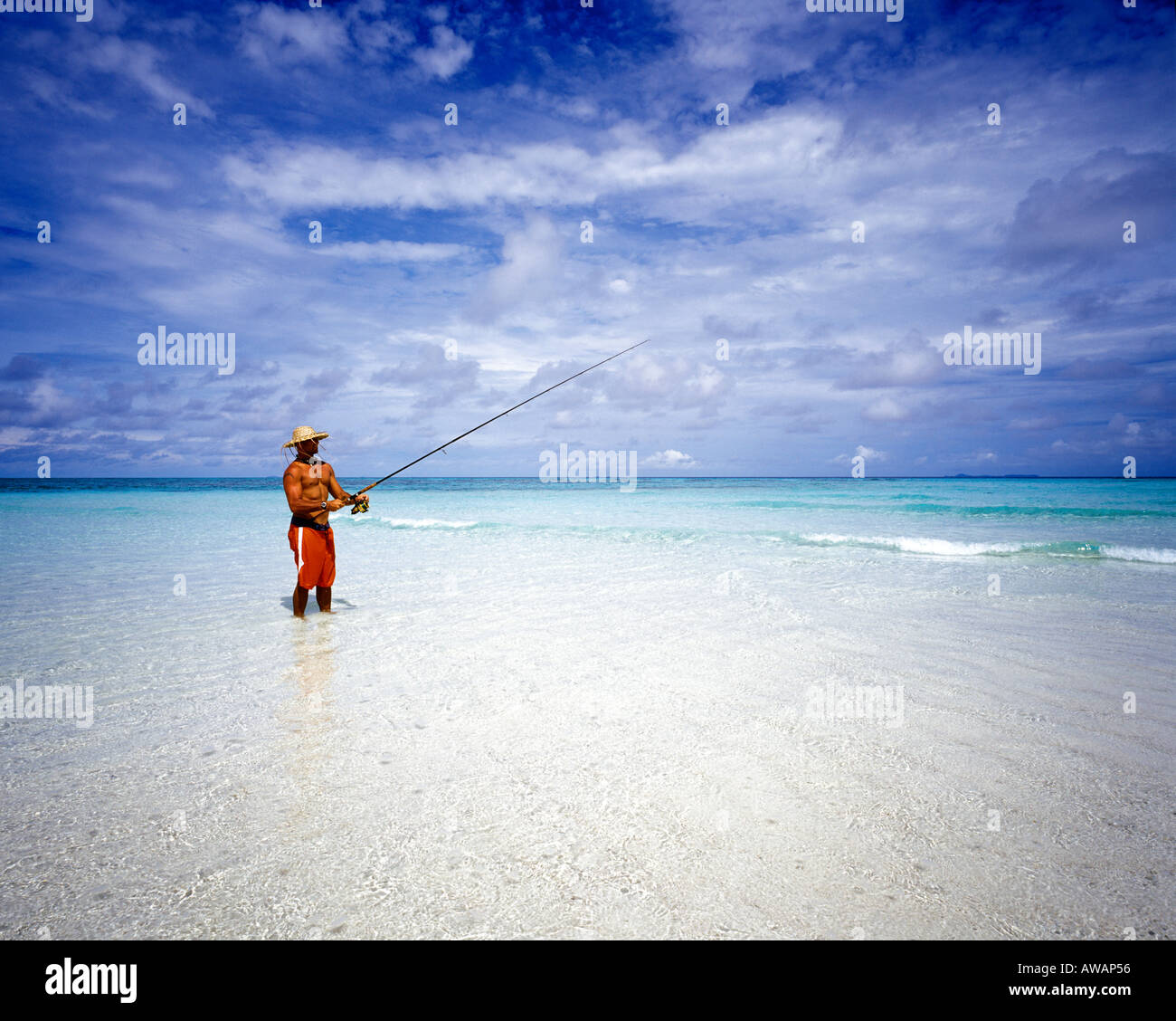 Man fishing from the beach Fiji model released Stock Photo - Alamy
